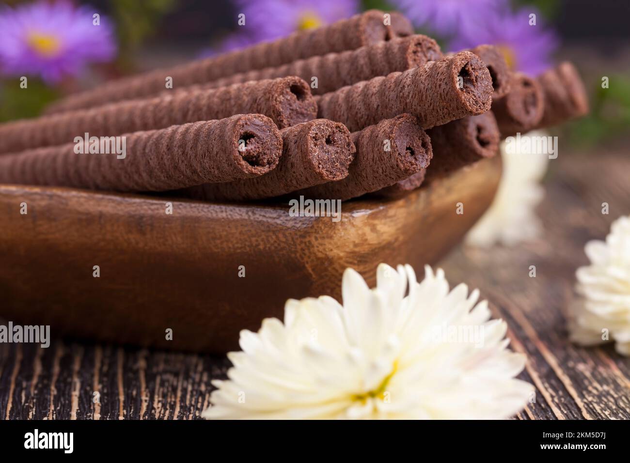chocolate tubes with chocolate filling, dessert of chocolate waffle ...