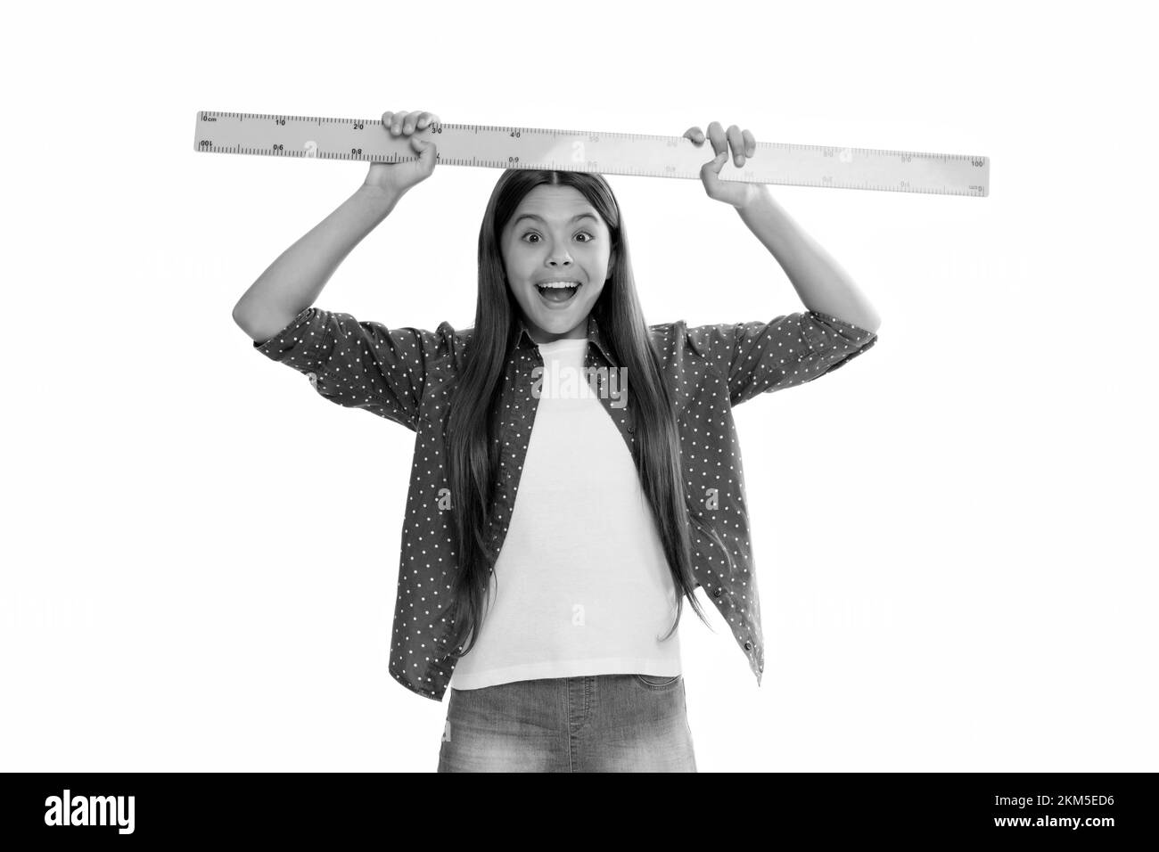 amazed teen girl hold ruler. back to school. algebra and geometry. kid ...