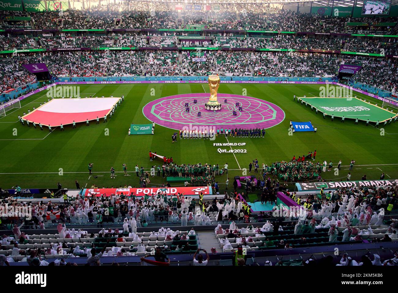 Poland and Saudi Arabia players line up before the FIFA World Cup Group ...