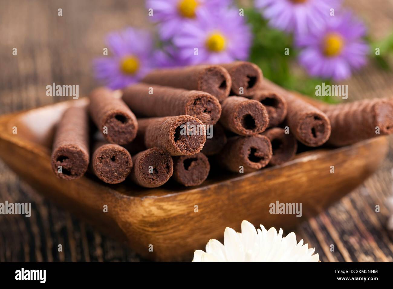 chocolate tubes with chocolate filling, dessert of chocolate waffle ...