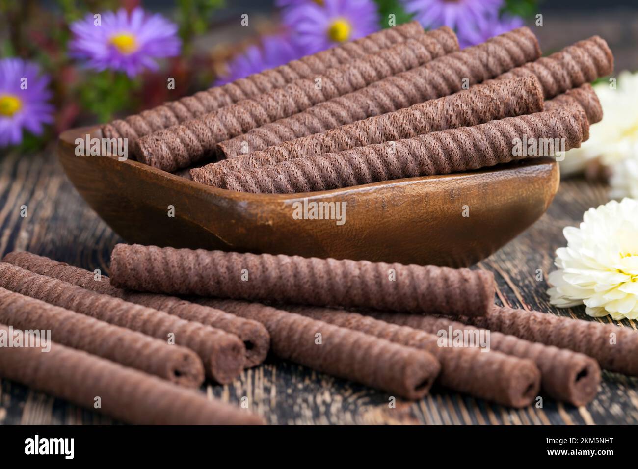 chocolate tubes with chocolate filling, dessert of chocolate waffle ...