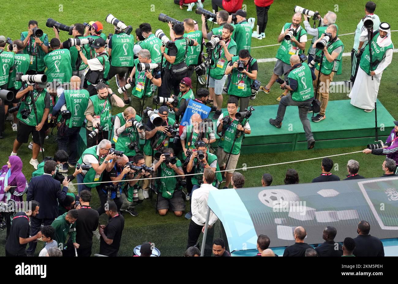 Photographers take pictures of the Saudi Arabia staff during the FIFA ...
