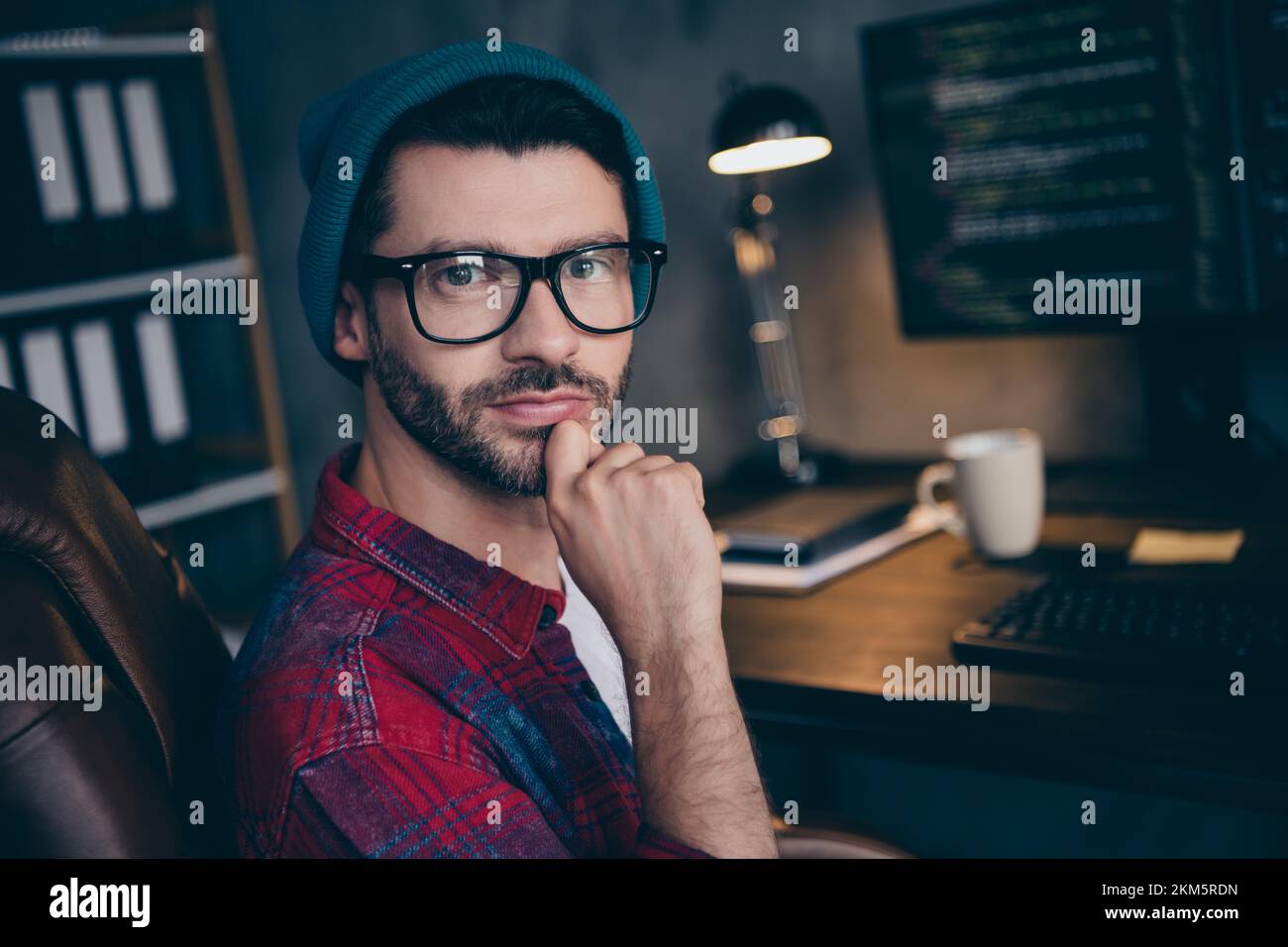 Photo of positive smart coder dressed hat glasses creating ...