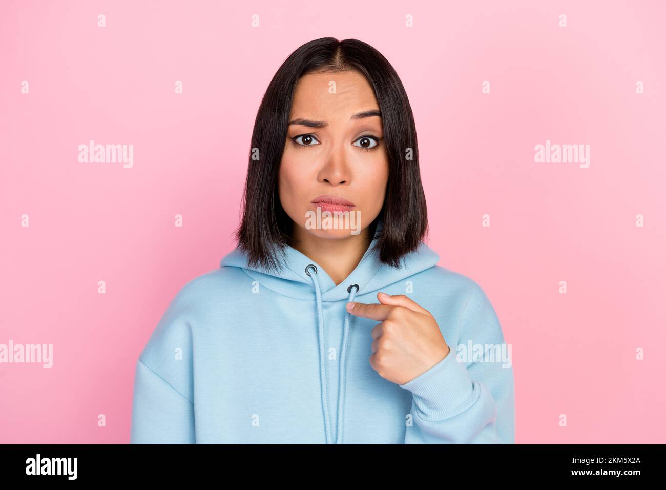 Photo portrait of pretty young girl point herself skeptical raise brow ...
