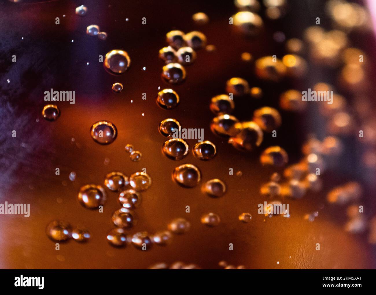 Macro look of carbonated bubbles from a drink in a glass Stock Photo - Alamy