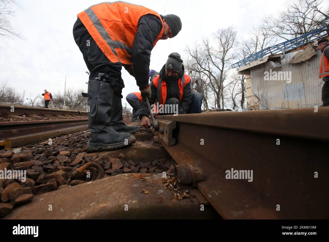 KHARKIV REGION, UKRAINE - NOVEMBER 25, 2022 - Railway workers repair ...