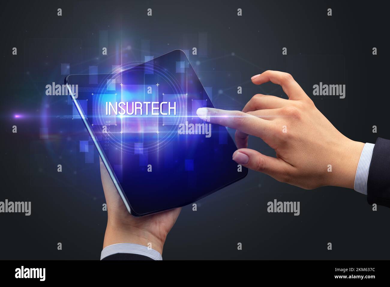 Businessman holding a foldable smartphone Stock Photo - Alamy