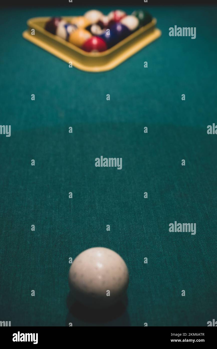 View of Ballard's balls with a cue ball and green Baize-covered table ...