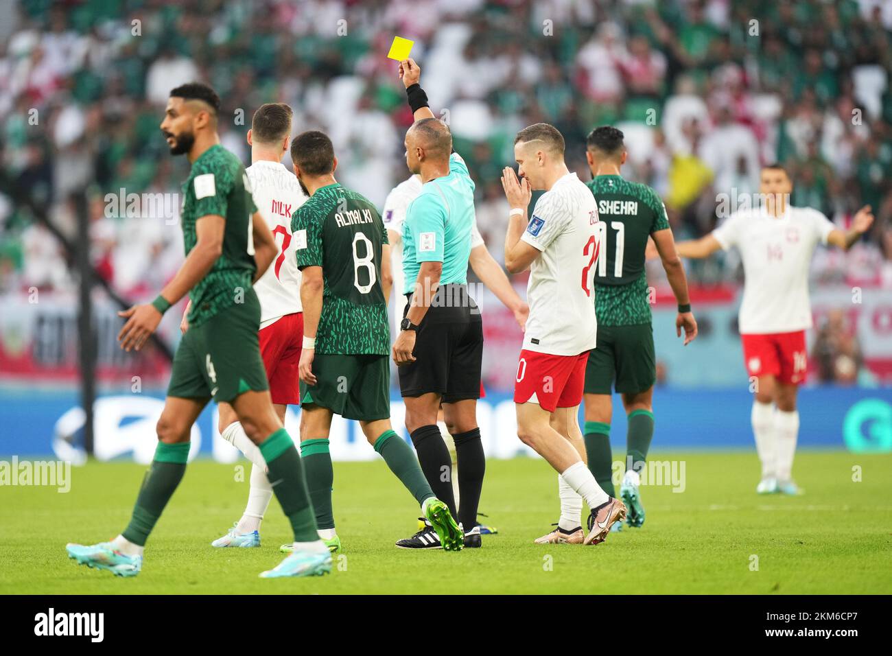Doha, Qatar. 26th Nov, 2022. The referee shows yellow card during the FIFA World Cup Qatar 2022 ...