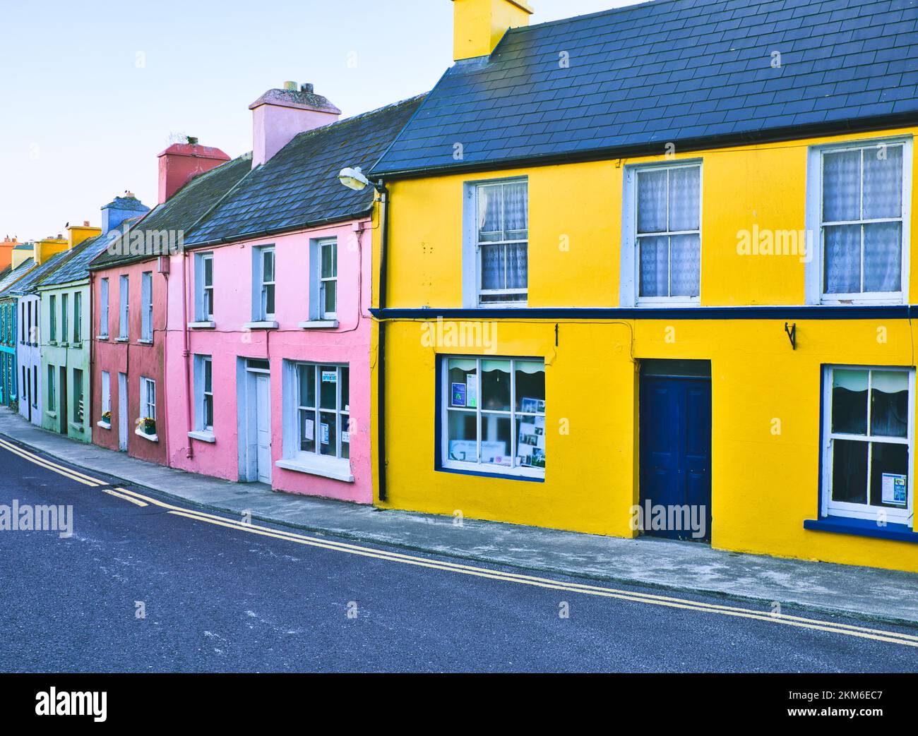 Row of colourful painted houses hi-res stock photography and images - Alamy