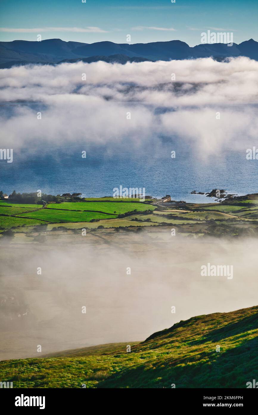 Misty summer morning view of the wild and beautiful Beara Peninsula ...