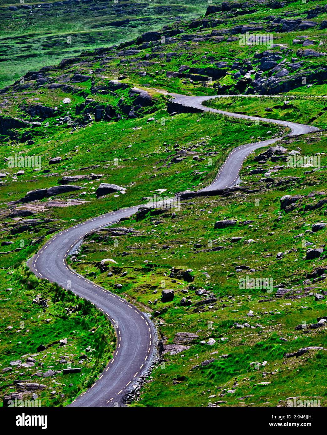 Road winding through the rugged Caha Mountains towards the peak at ...