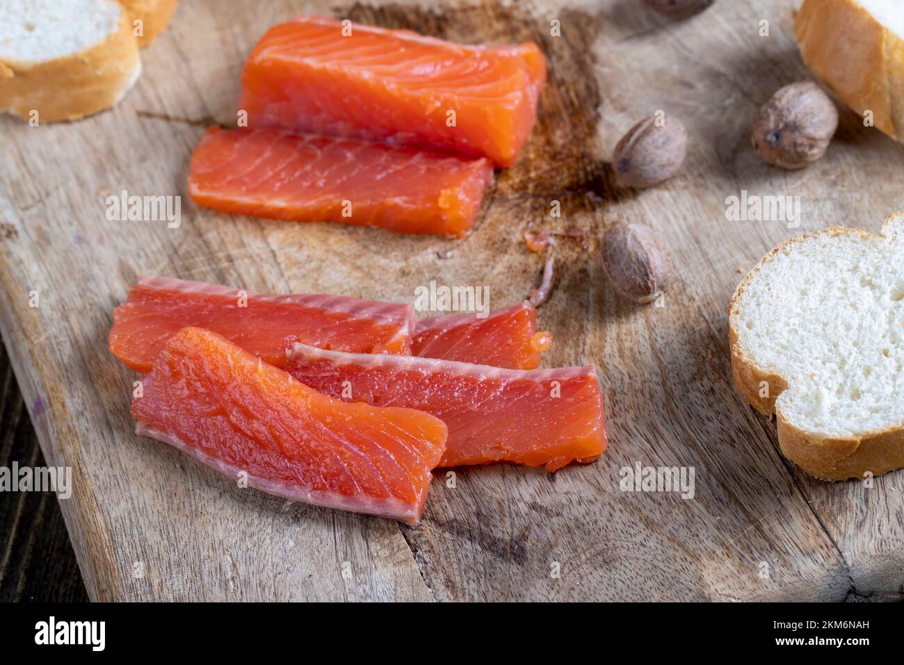 red salted salmon fish meat on a chopping board, salted salmon fish ...
