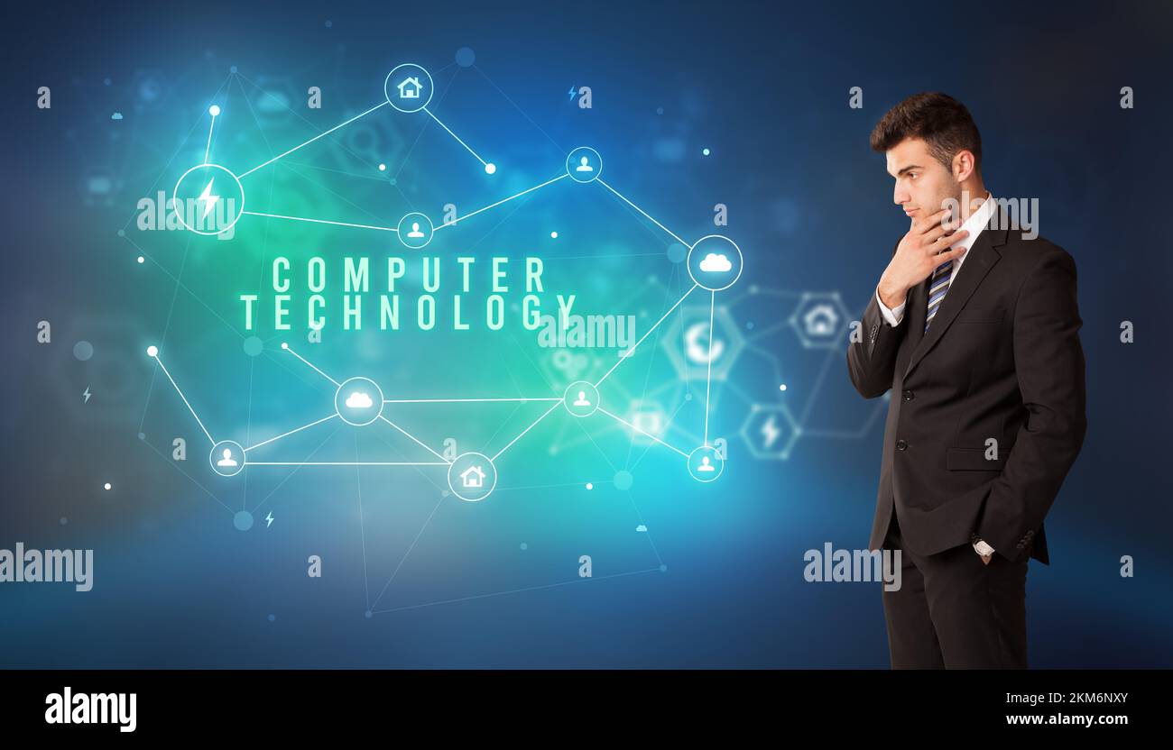 Businessman thinking about technology concept Stock Photo - Alamy