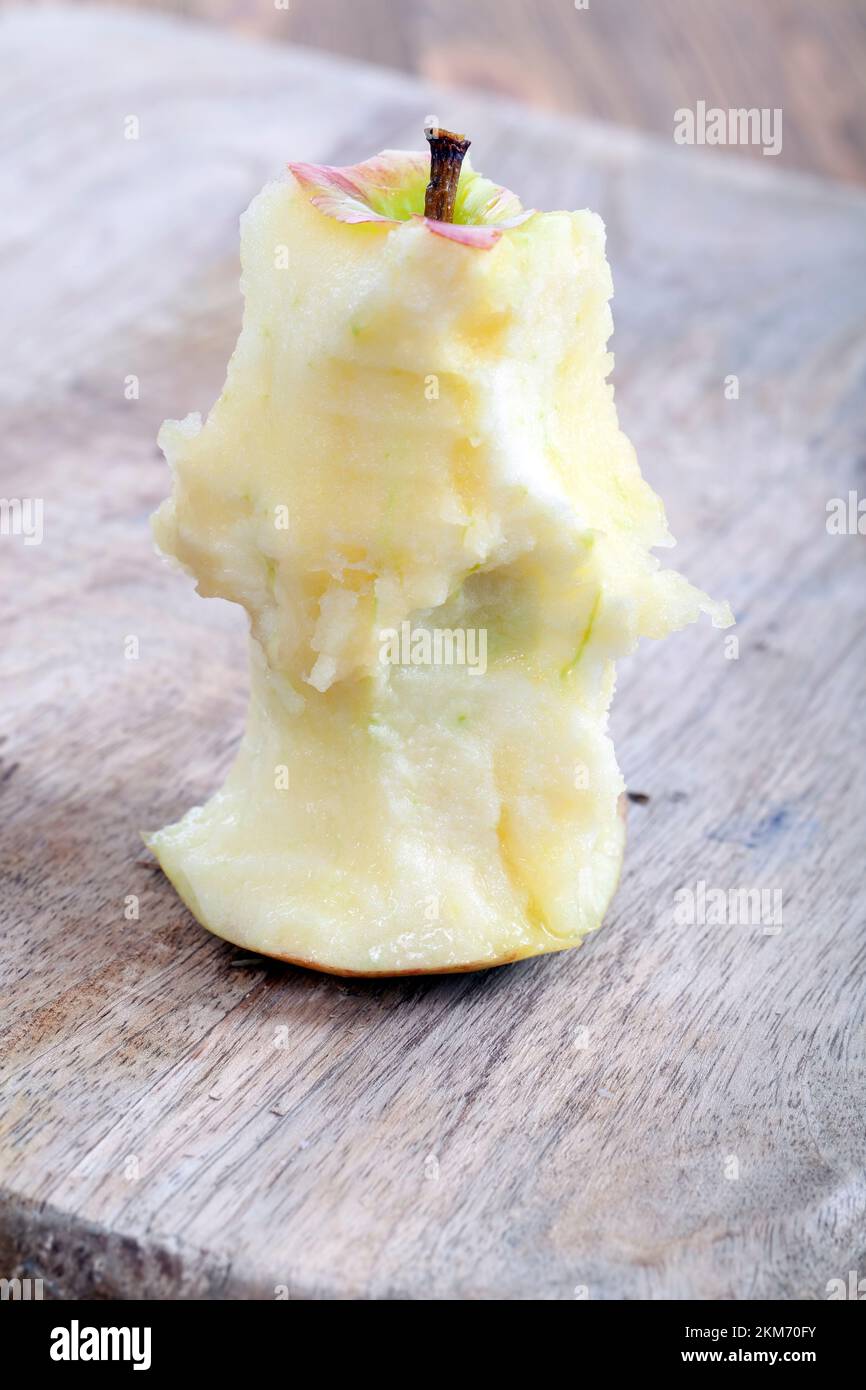 red ripe apple on a wooden chopping board, ripe juicy apple on the ...