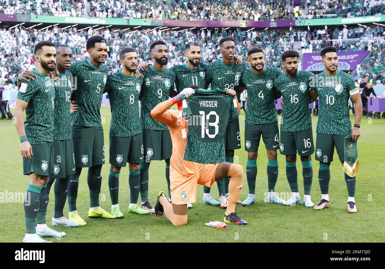 Saudi Arabia's starting eleven pose ahead of a World Cup Group C ...