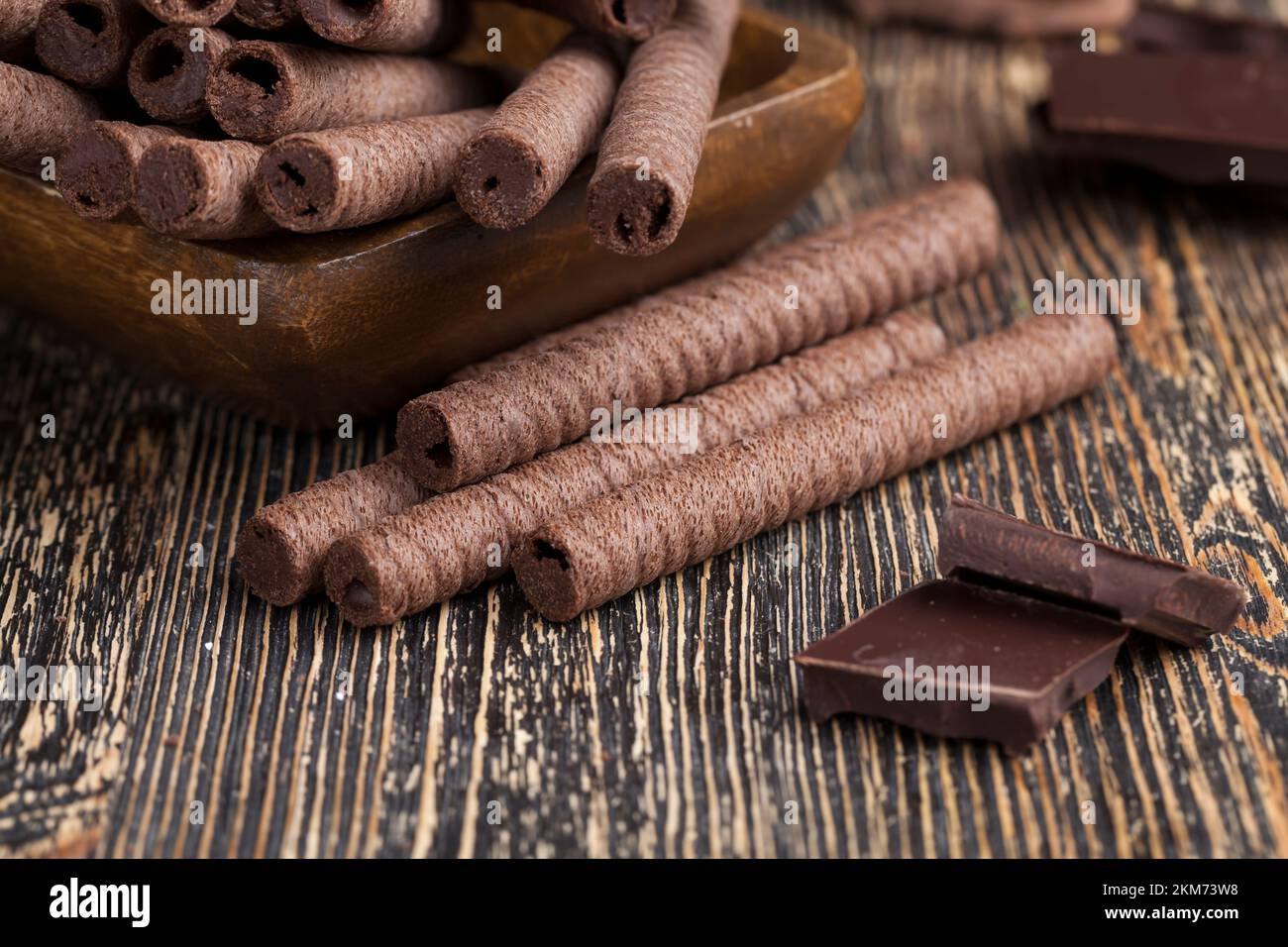 chocolate tubes with chocolate filling, dessert of chocolate waffle ...