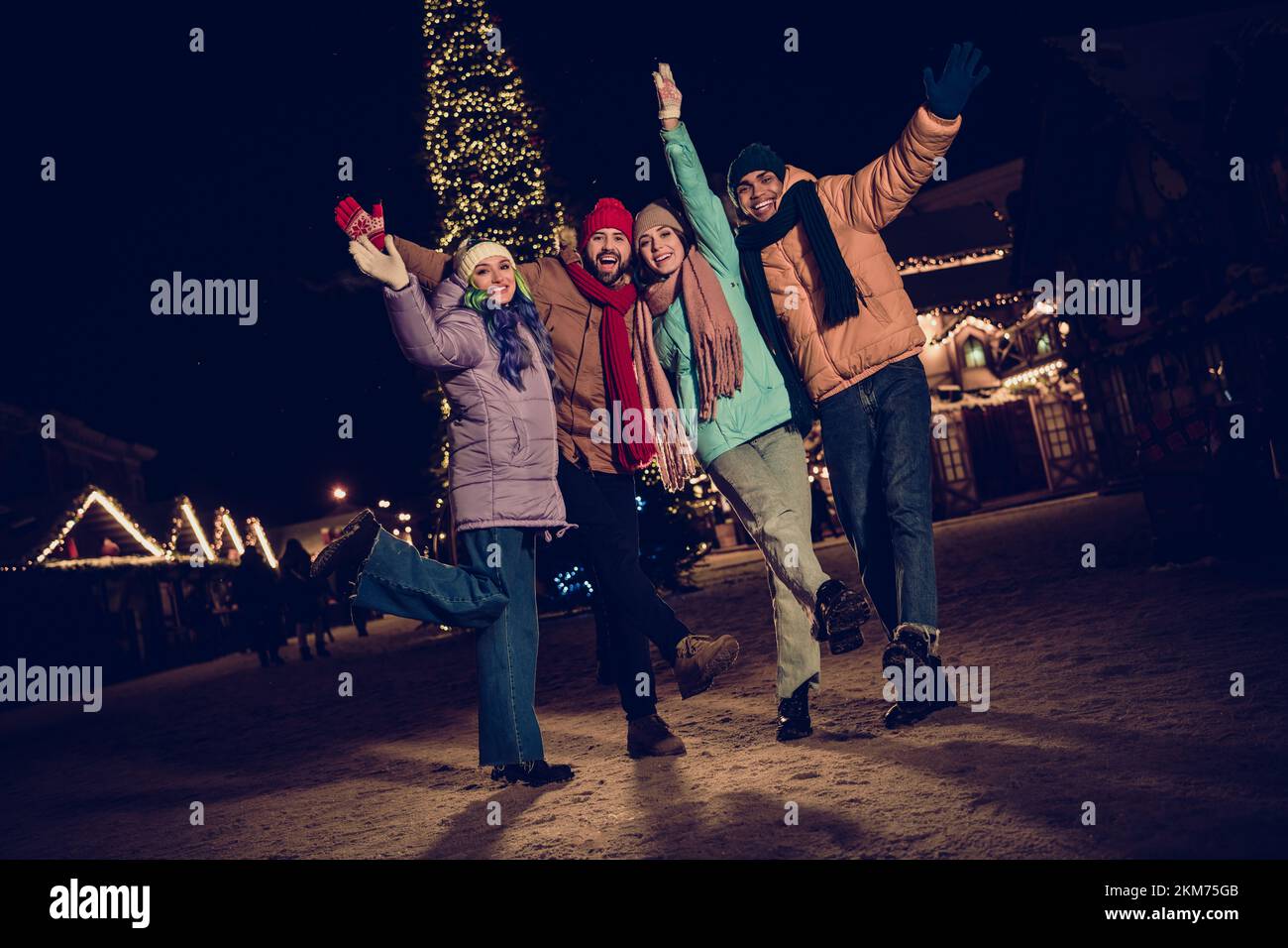 Photo of different funny people wear warm clothes take shot near big ...