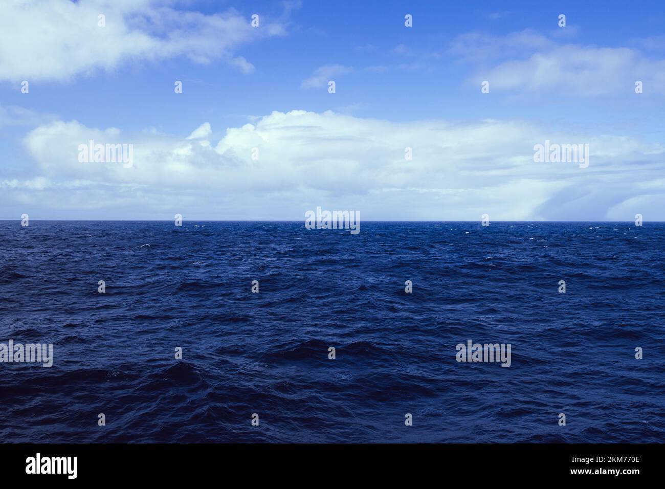 The blue sky and ocean meet in the Drake Passage Stock Photo - Alamy
