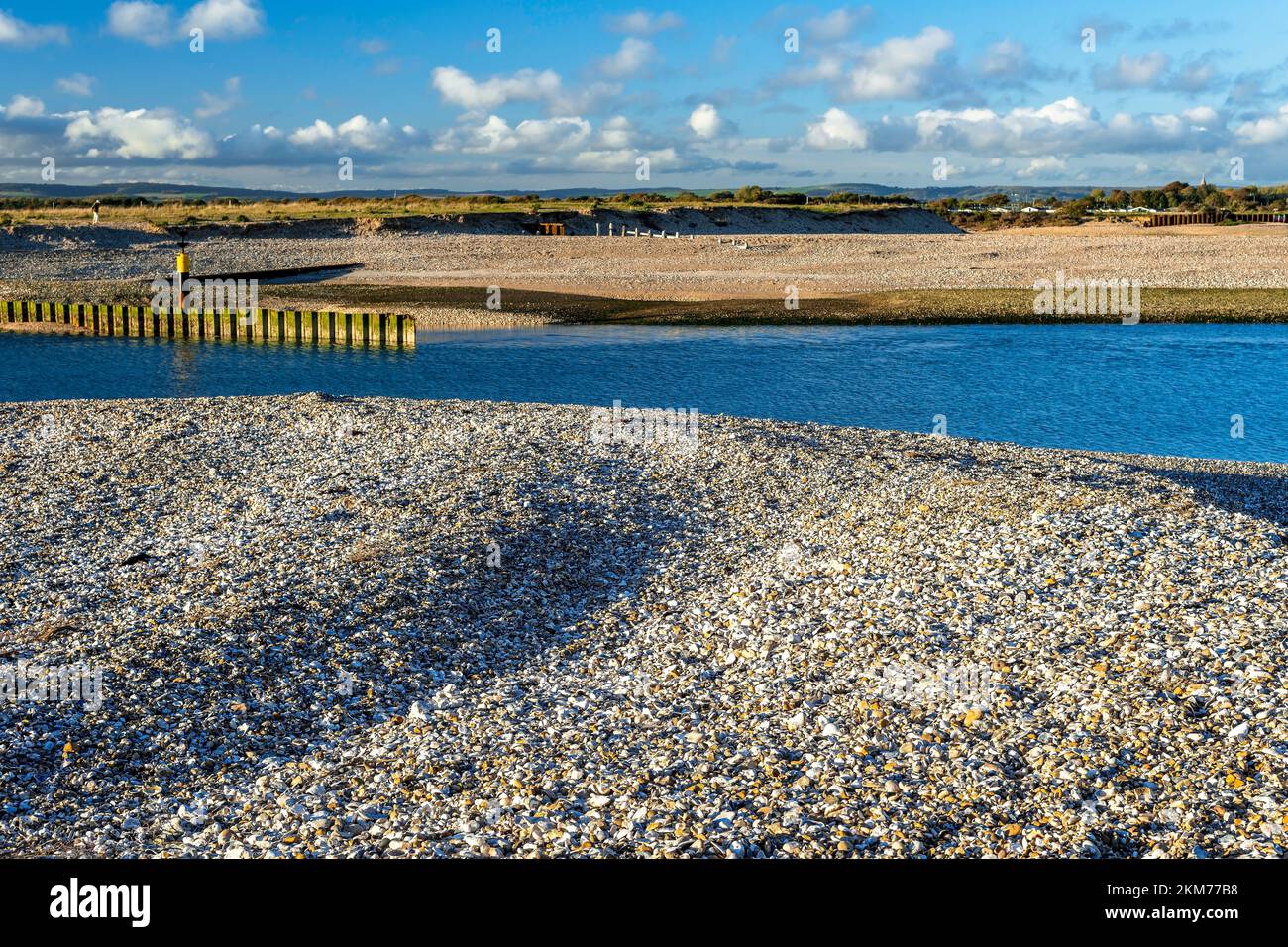 Views the sea and stone at Pagham, West Sussex, UK Stock Photo - Alamy
