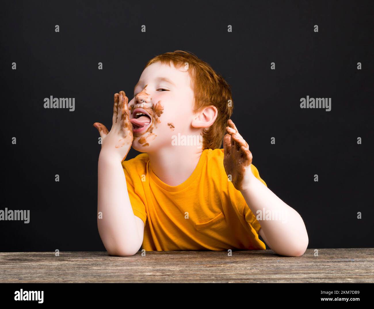 real milk chocolate and a baby that is completely smeared in melted ...