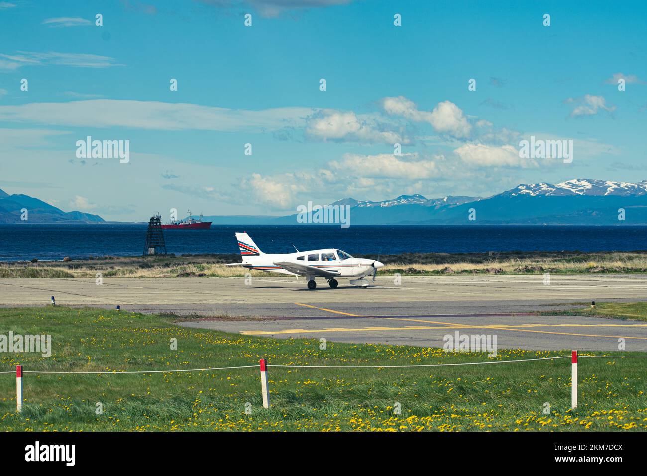 A small single engine plane on the landing strip in Ushuaia Argentina ...