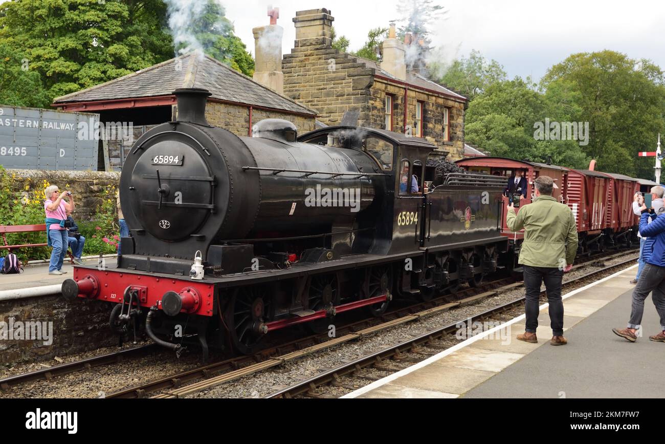 LNER class J27 No 65894 arrives at Goathland station with a freight ...