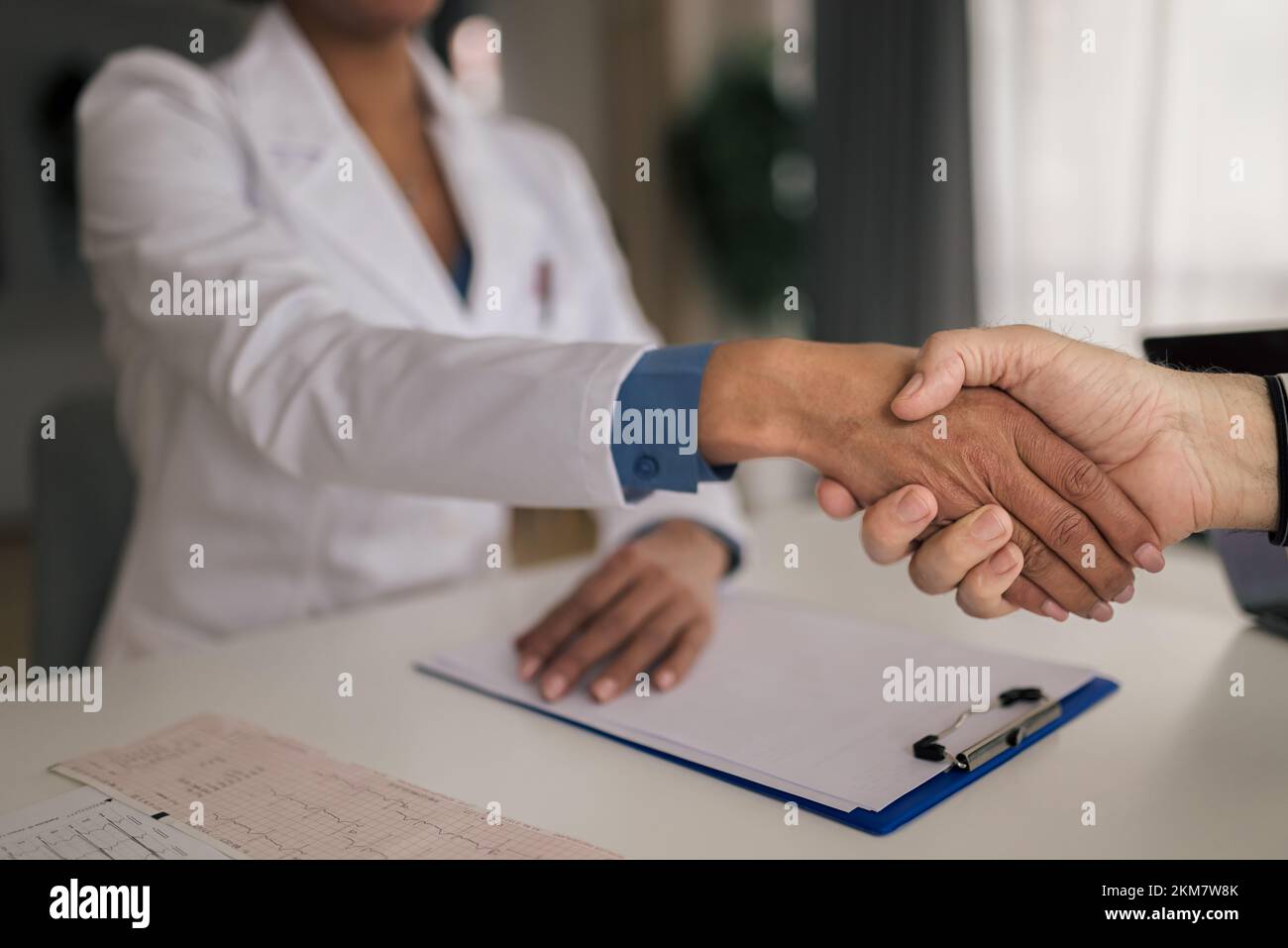 Closeup picture of adult african-american woman, offering a handshake ...