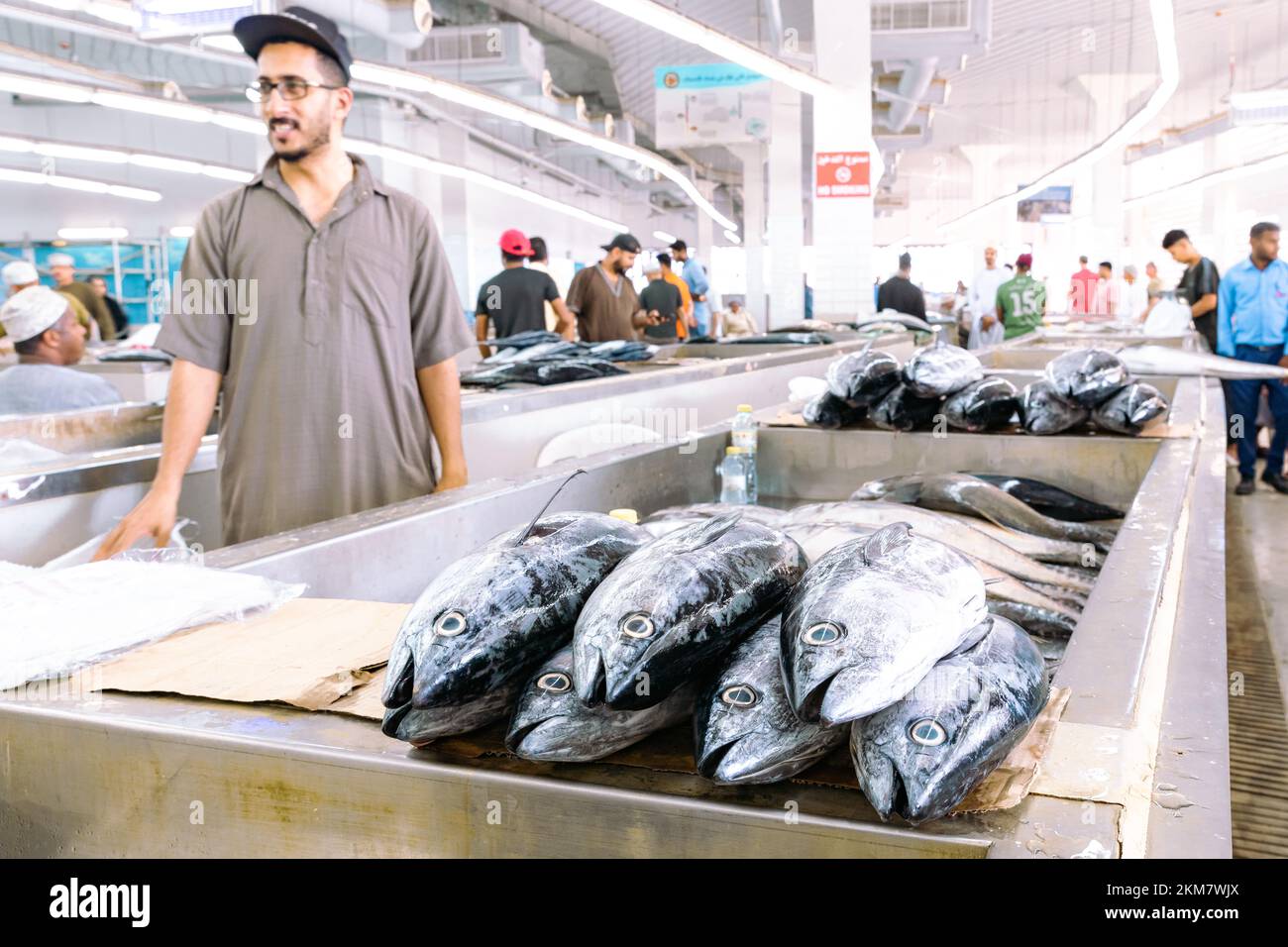MUTRAH, OMAN - NOVEMBER 14, 2022: Vendors selling tuna, sardines and ...