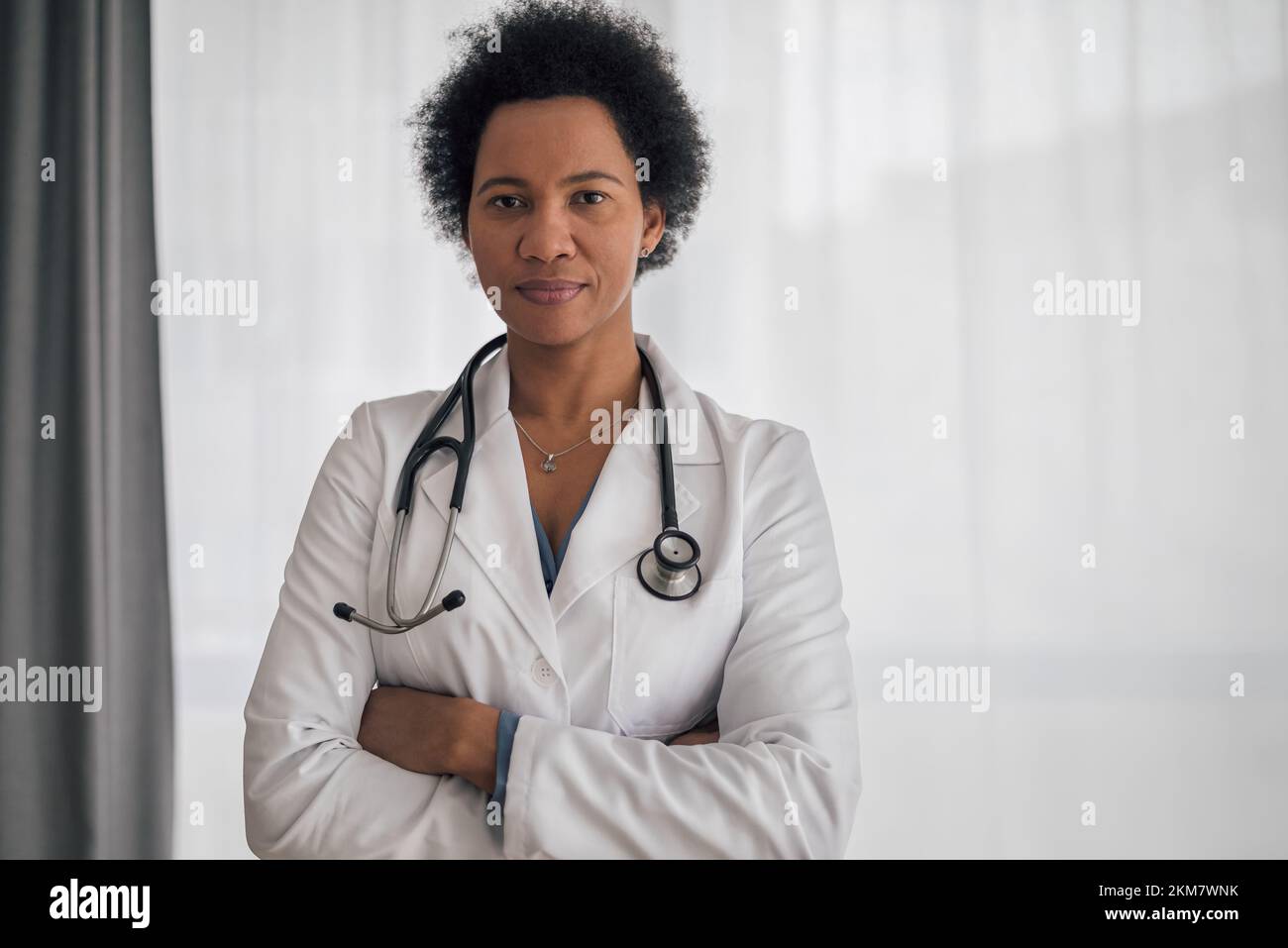 Picture of serious female hospital chairman, preparing to help her ...