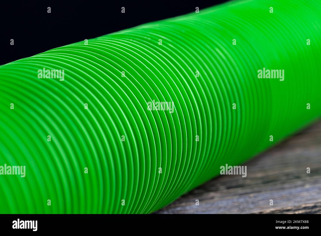 disposable plastic cups of green color, a group of clean new plastic ...