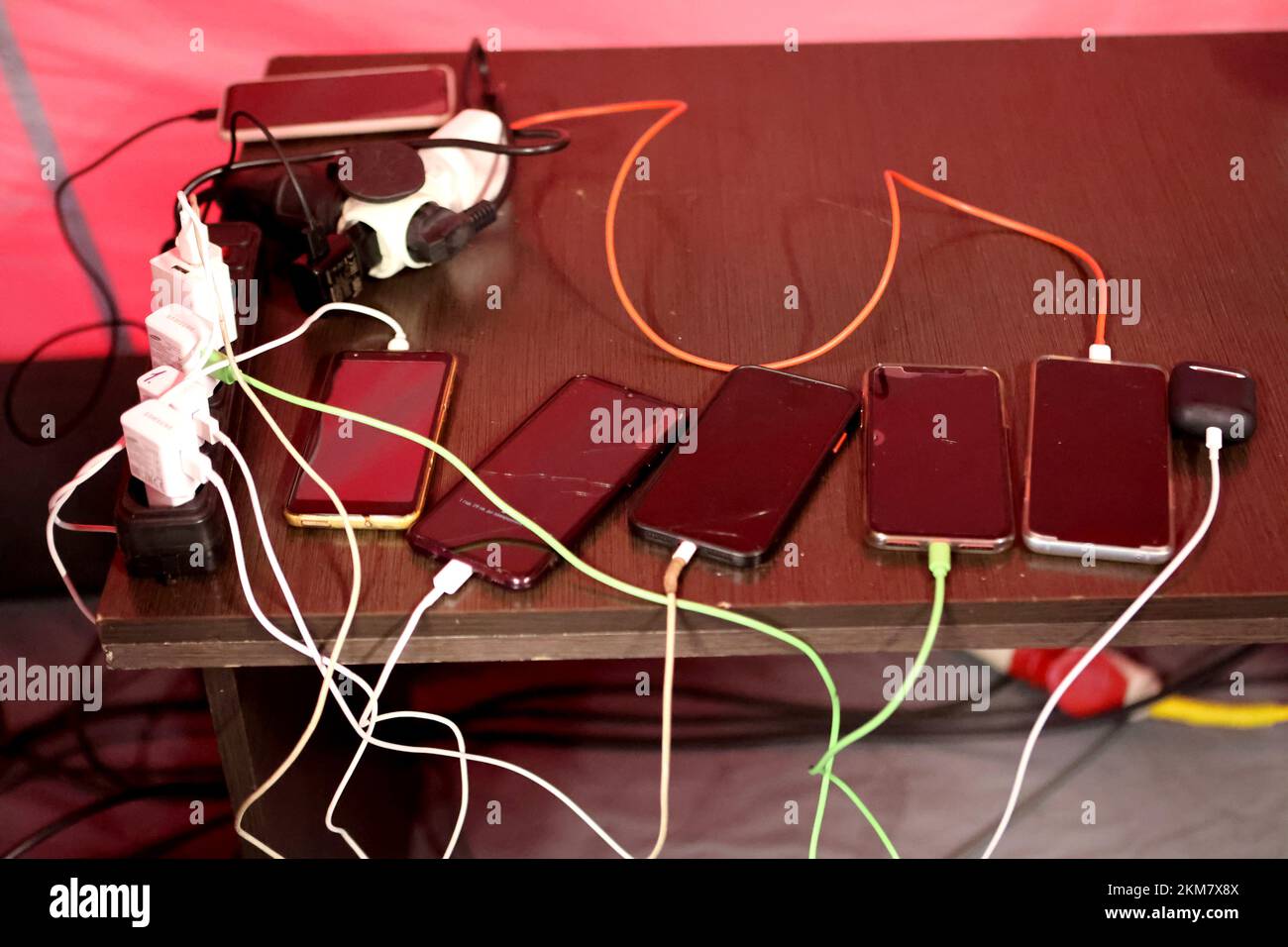 IVANO-FRANKIVSK, UKRAINE - NOVEMBER 25, 2022 - Mobile phones are being ...