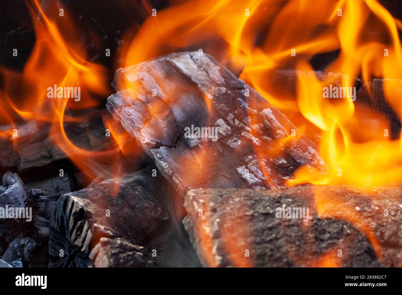 dry firewood in the fire to get fire, dry logs burning in the fire from ...