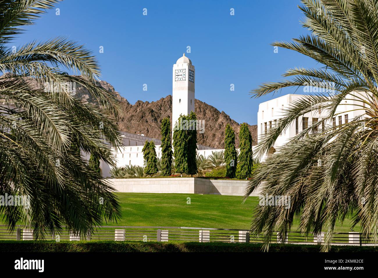 Road with palm trees. Traditional Omani architecture. Old Town of ...