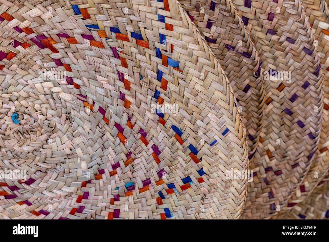 Traditional wicker baskets, exhibited in market shops of the old town ...