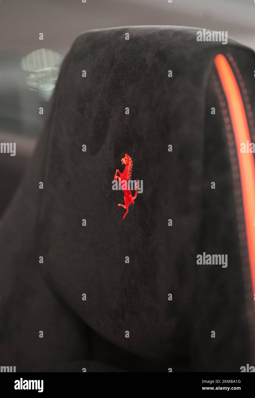 The Ferrari F8 Spider Headrest in black Alcantara with red horse ...