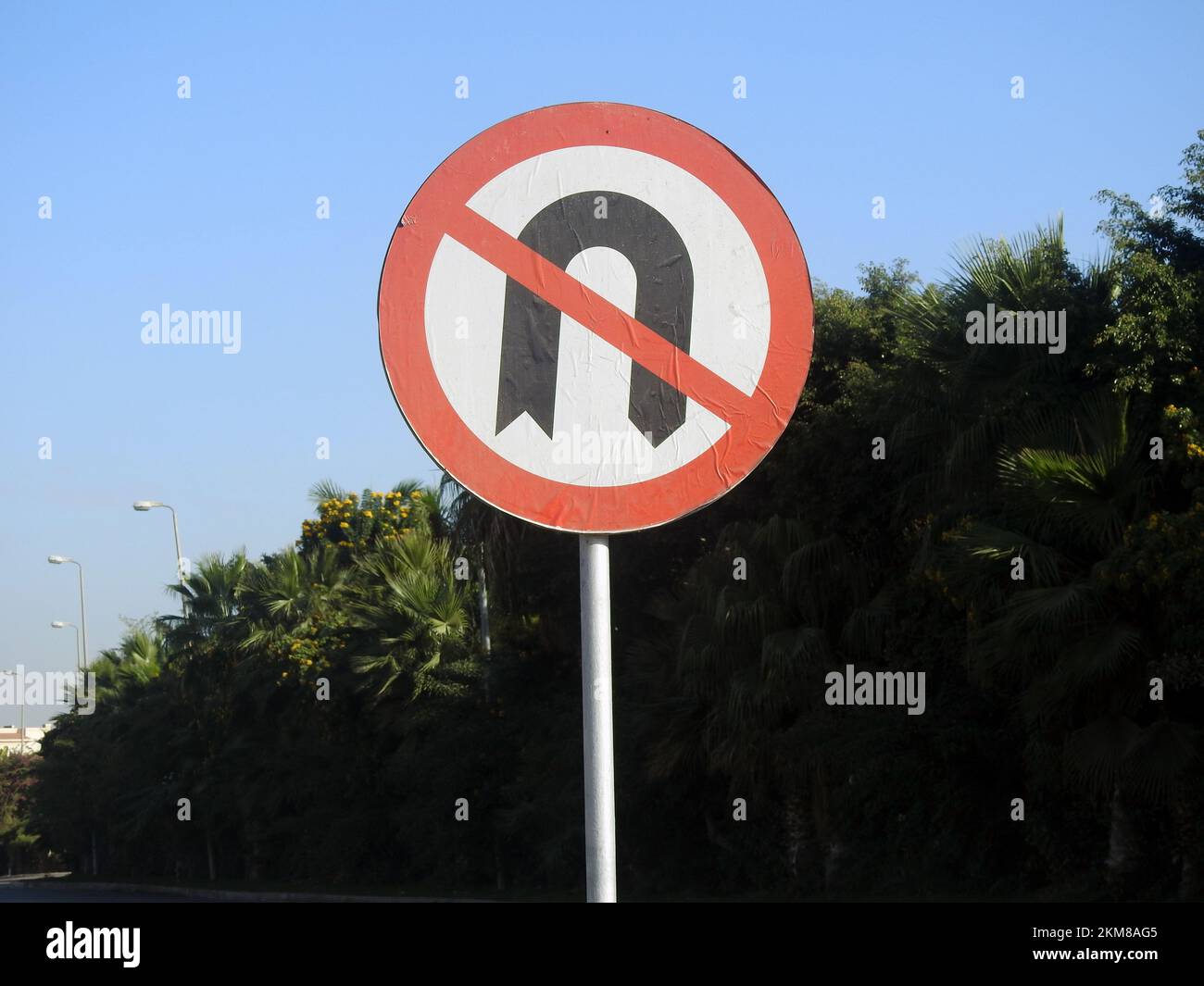 No U-turn sign, a regulatory sign posted at intersections to indicate ...