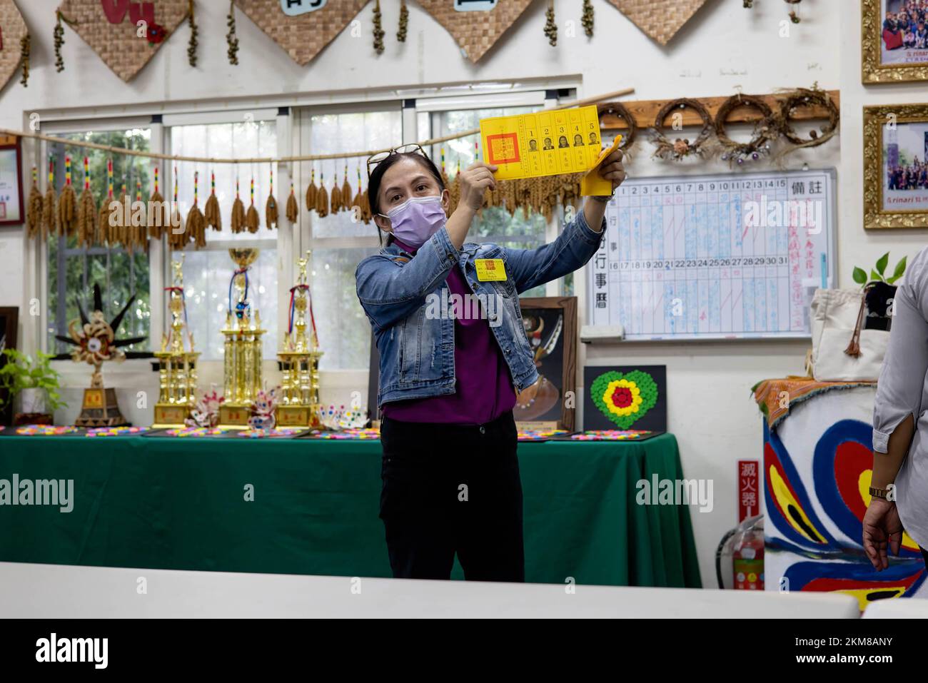 Polling official at Rinari polling station seen showing an invalid vote ...