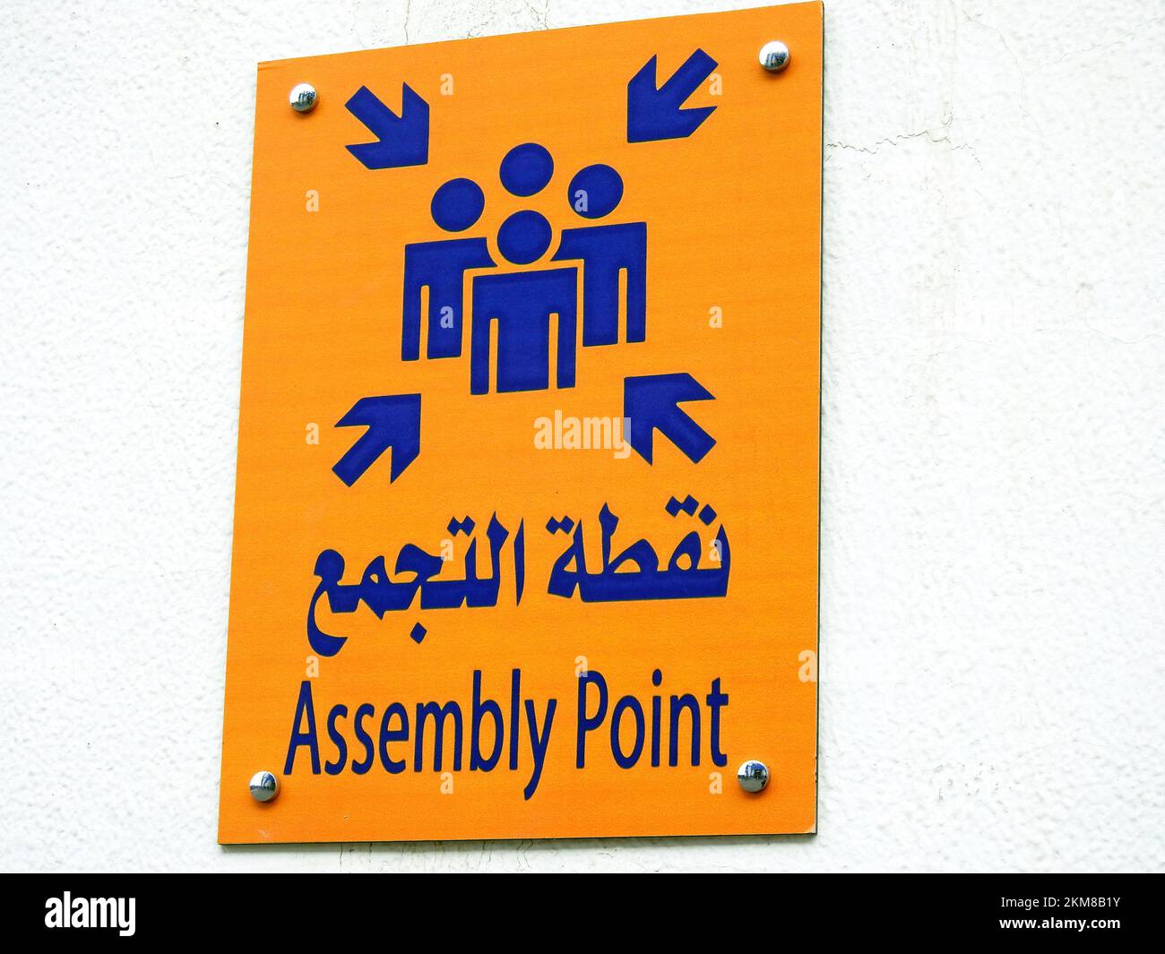 Assembly Point Sign in Arabic and English languages that uses safety ...