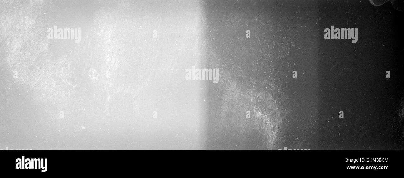 Blank grained film strip texture background with heavy grain and dust ...