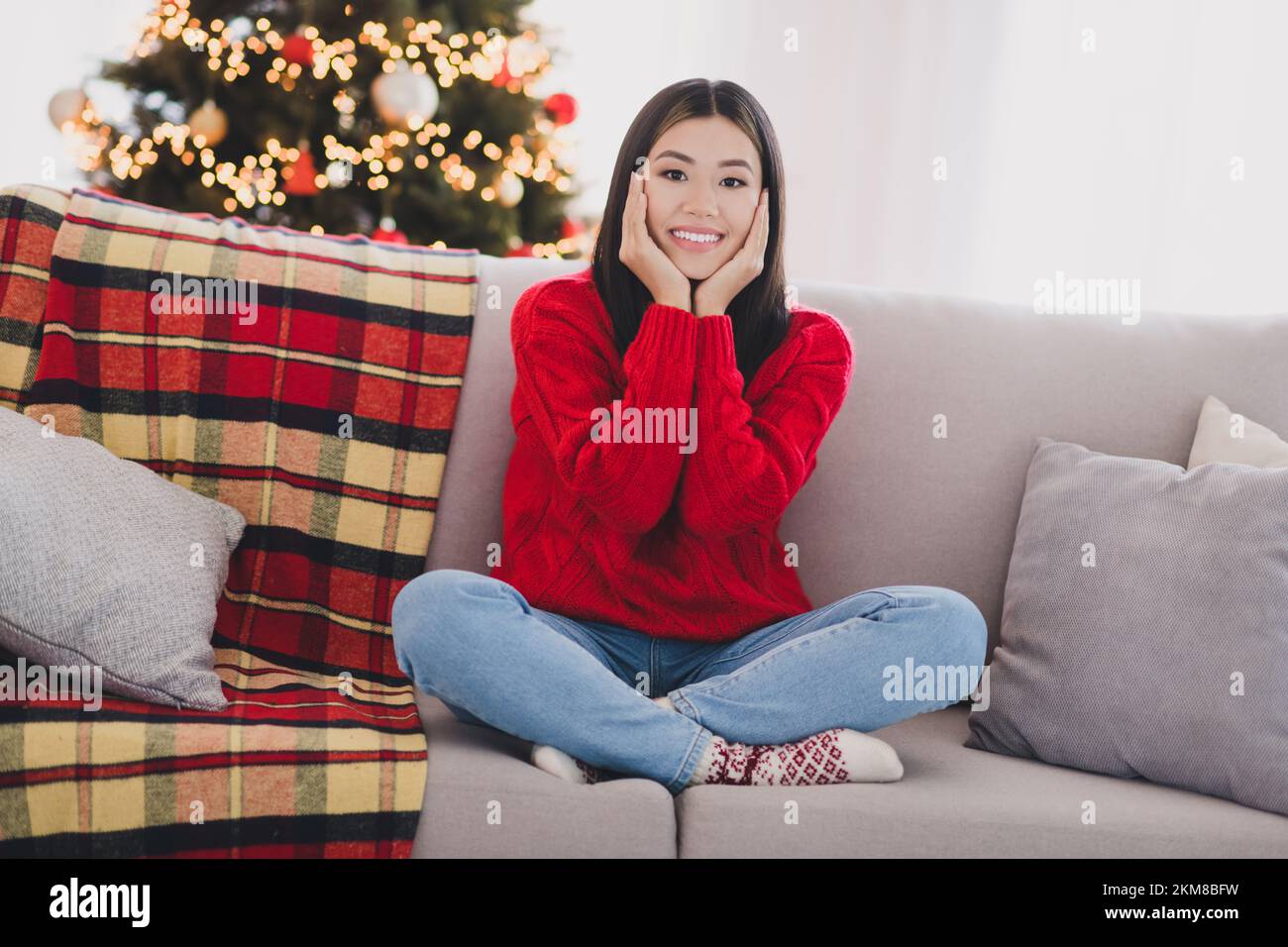 Photo of cheerful adorable girl wear xmas red pullover smiling arms ...