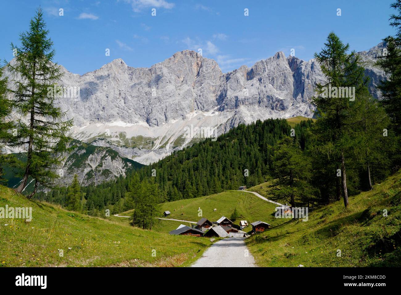 wooden alpine cabins by the foot of the Dachstein mountain in the ...