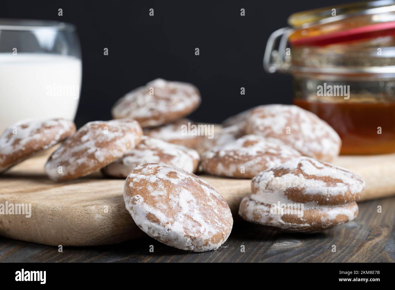 iced sugar gingerbread on a cutting board, flour pastry made of ...