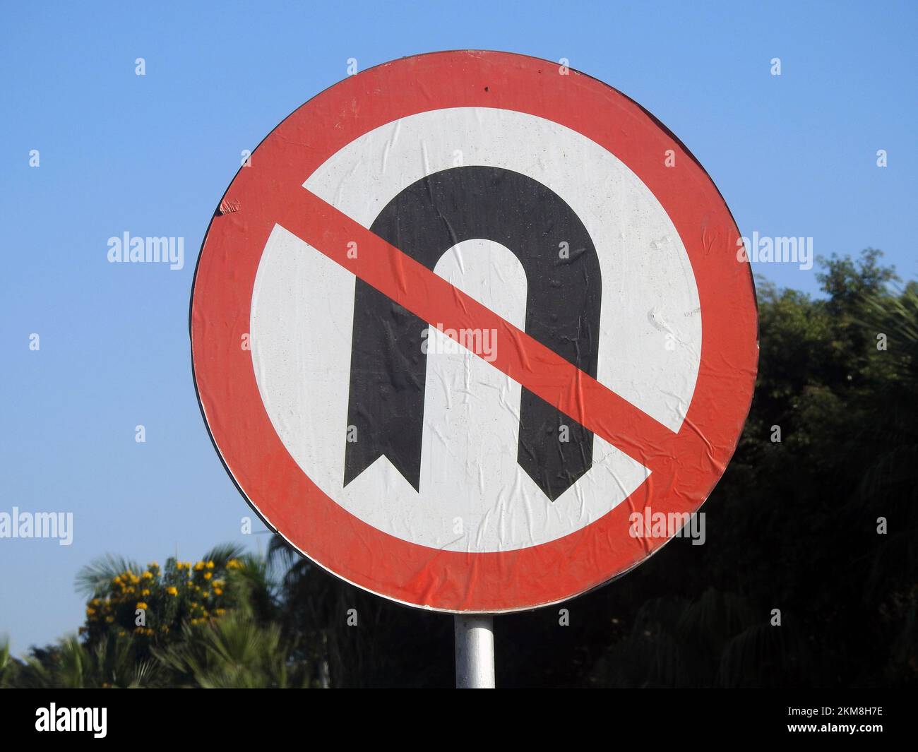 No U-turn sign, a regulatory sign posted at intersections to indicate ...
