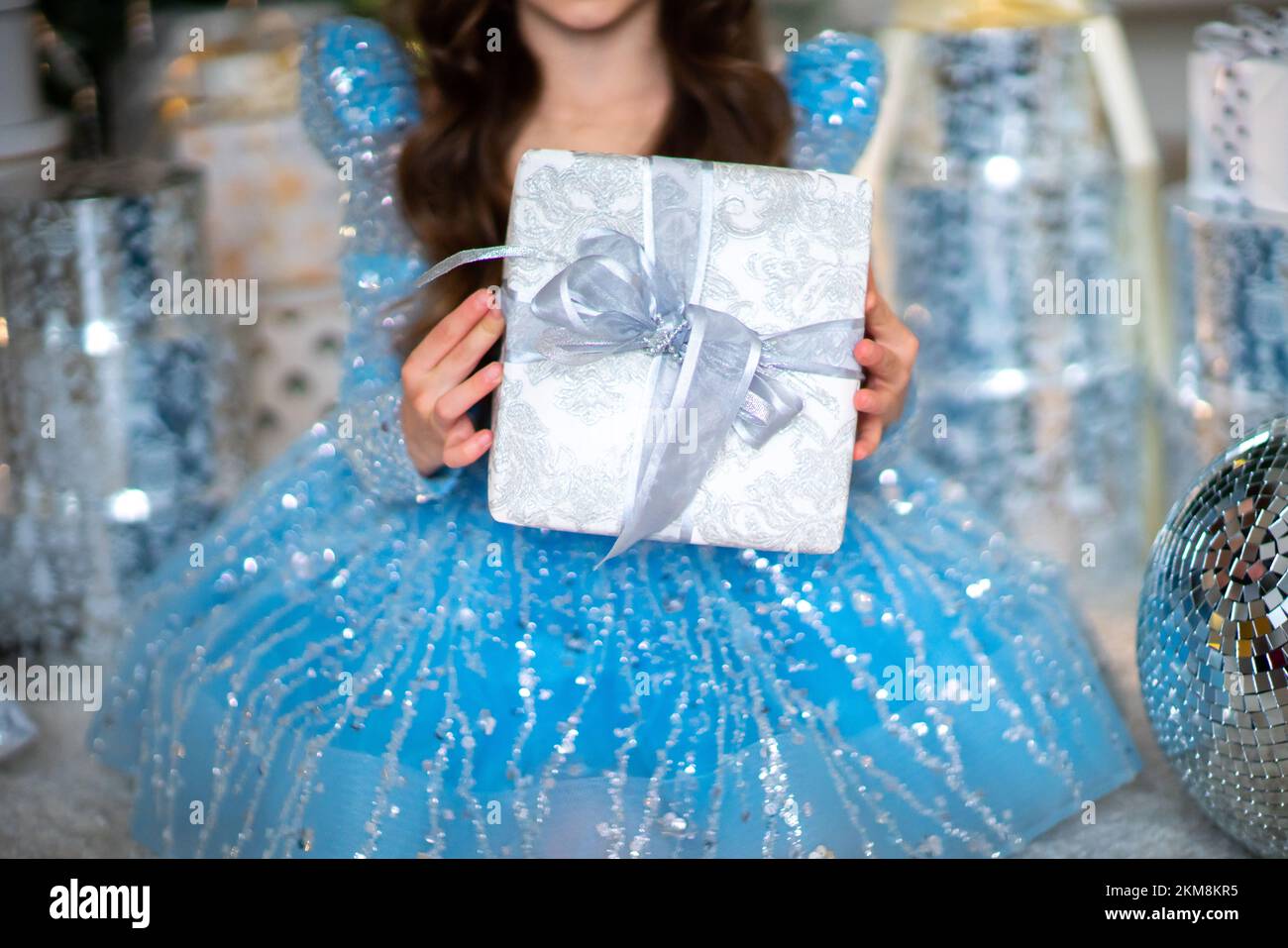 Female hands hold a gift box. Christmas, new year, birthday concept ...