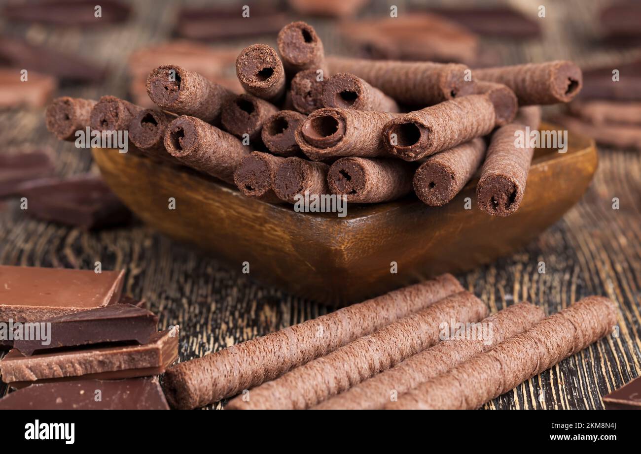 chocolate tubes with chocolate filling, dessert of chocolate waffle ...
