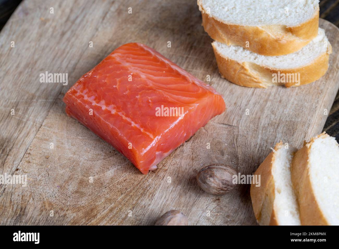 red salted salmon fish meat on a chopping board, salted salmon fish ...