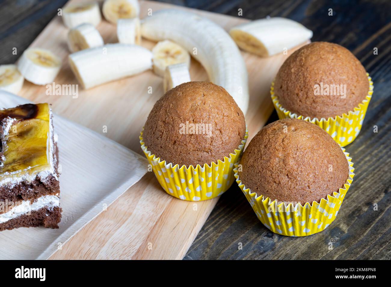 delicious wheat cupcakes on a black wooden table , fresh homemade ...