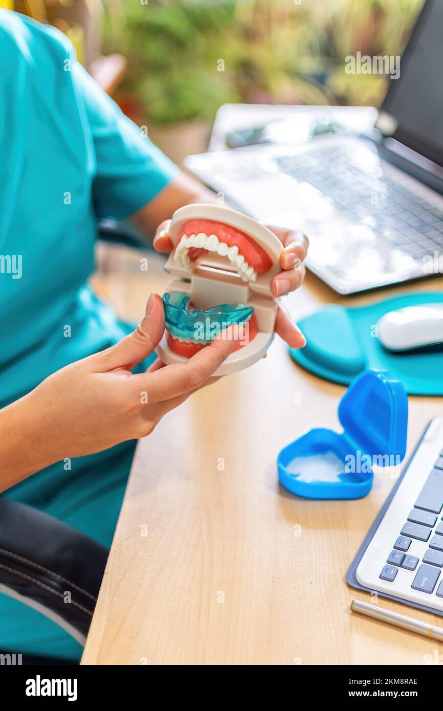 A vertical shot of a dentist consultation, dental brace, or teeth ...