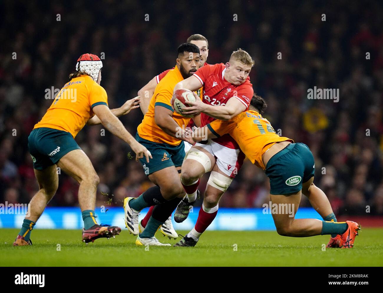 Wales' Jac Morgan (second right) is tackled by Australia's Jordan ...